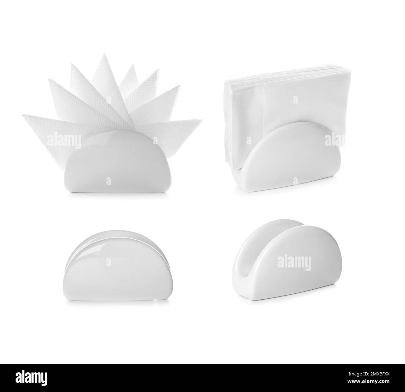Set of modern ceramic napkin holders on white background Stock Photo ...