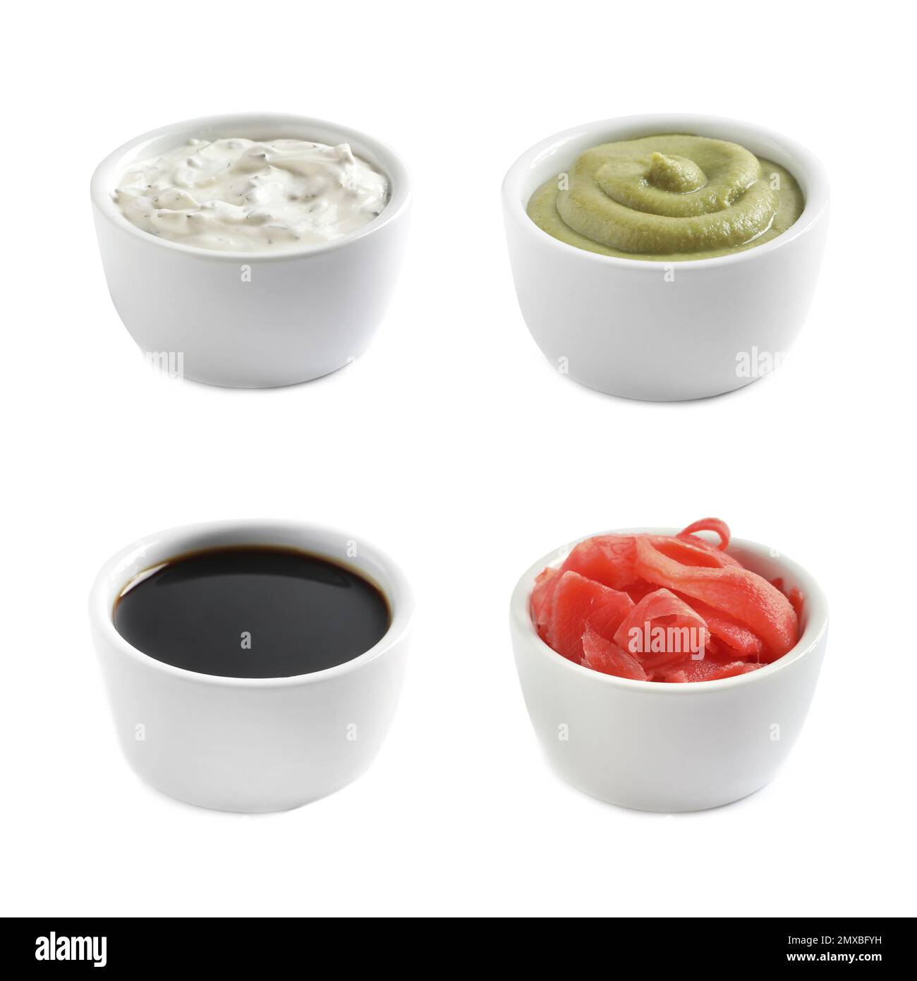 Set of different delicious sauces and condiments on white background ...
