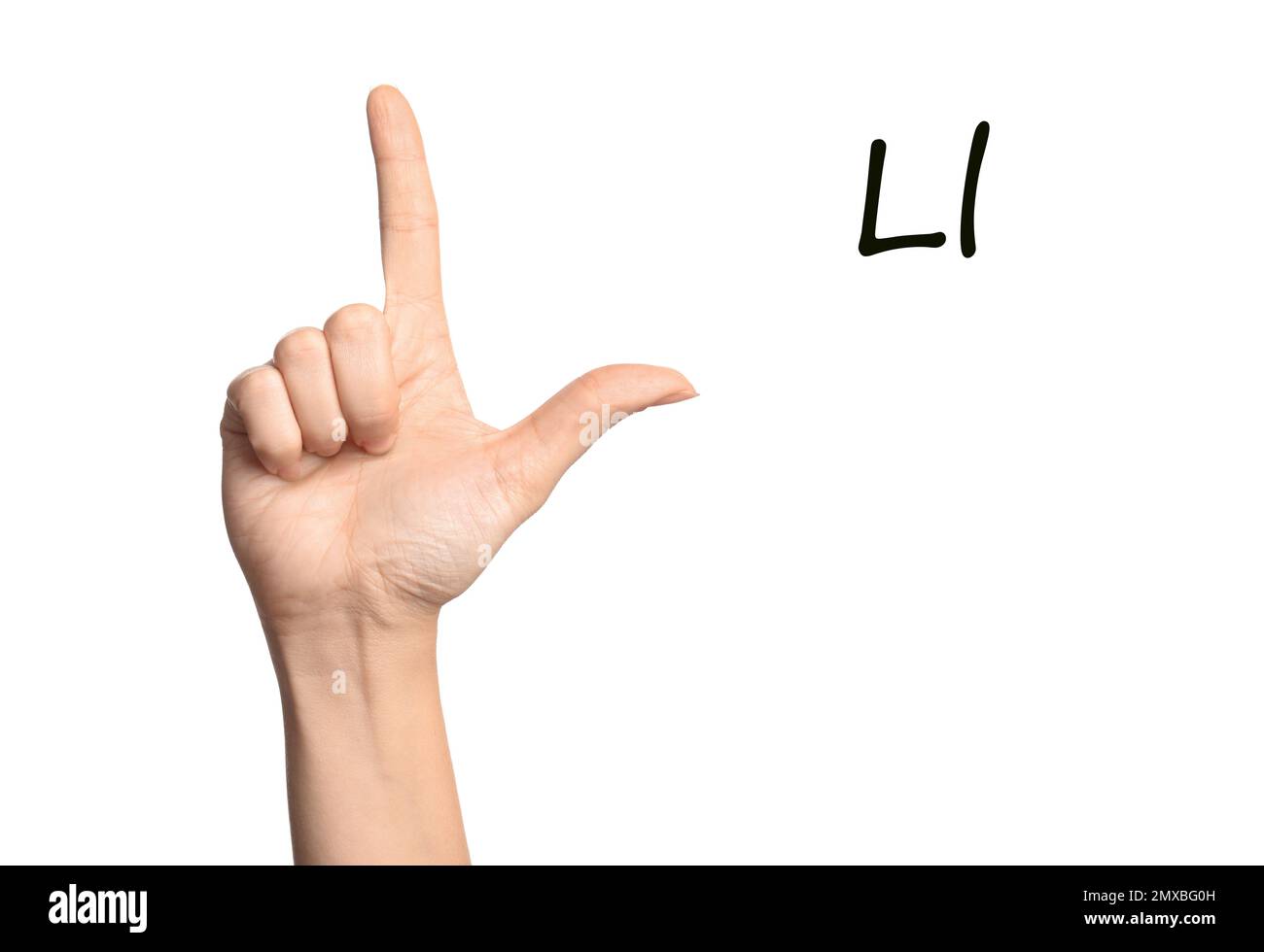 Woman showing letter L on white background, closeup. Sign language ...