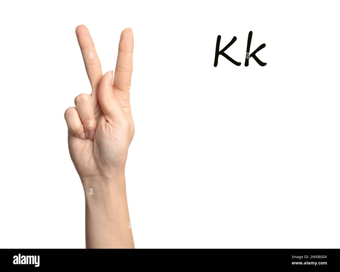 Woman showing letter K on white background, closeup. Sign language ...