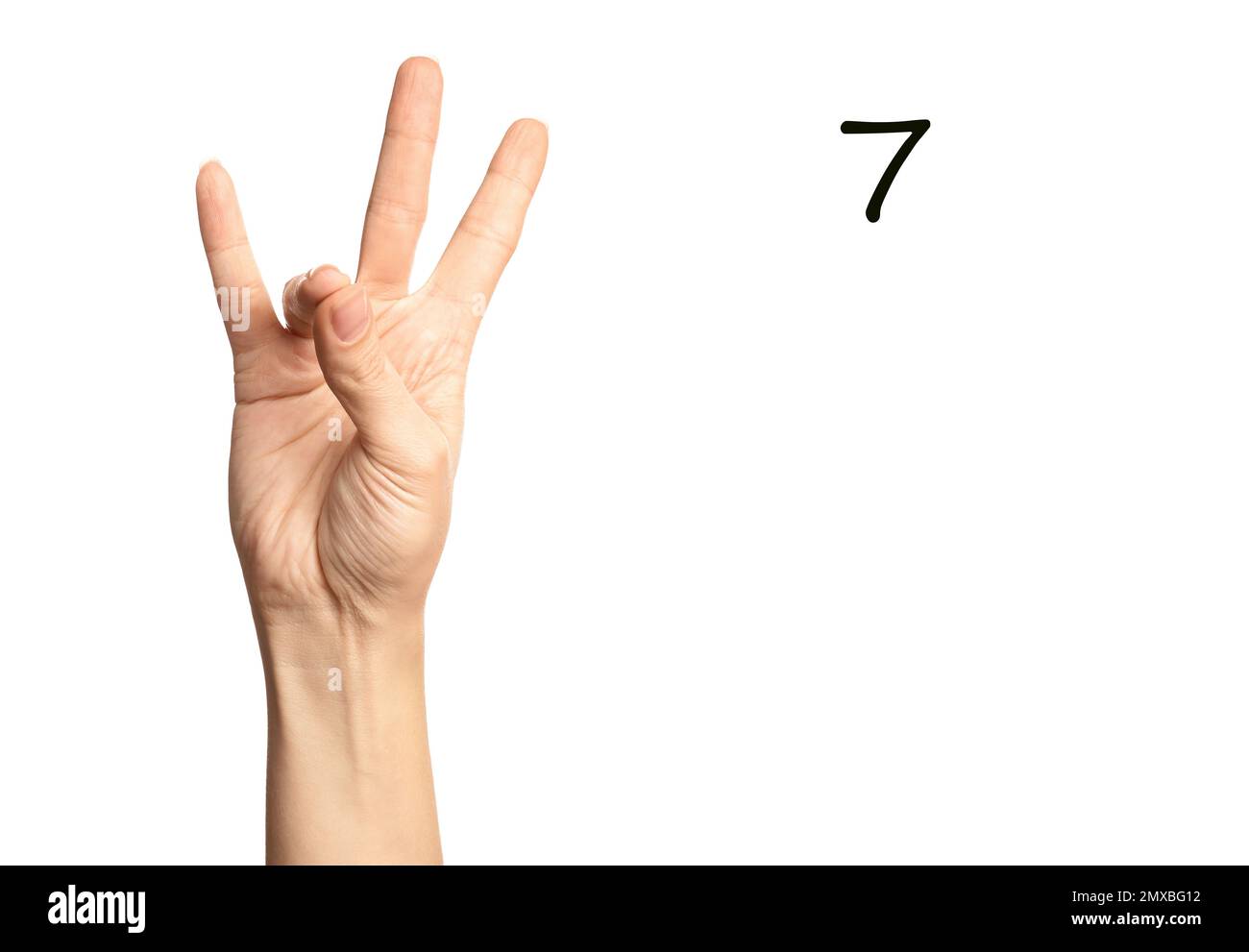 Woman showing number seven on white background, closeup. Sign language ...