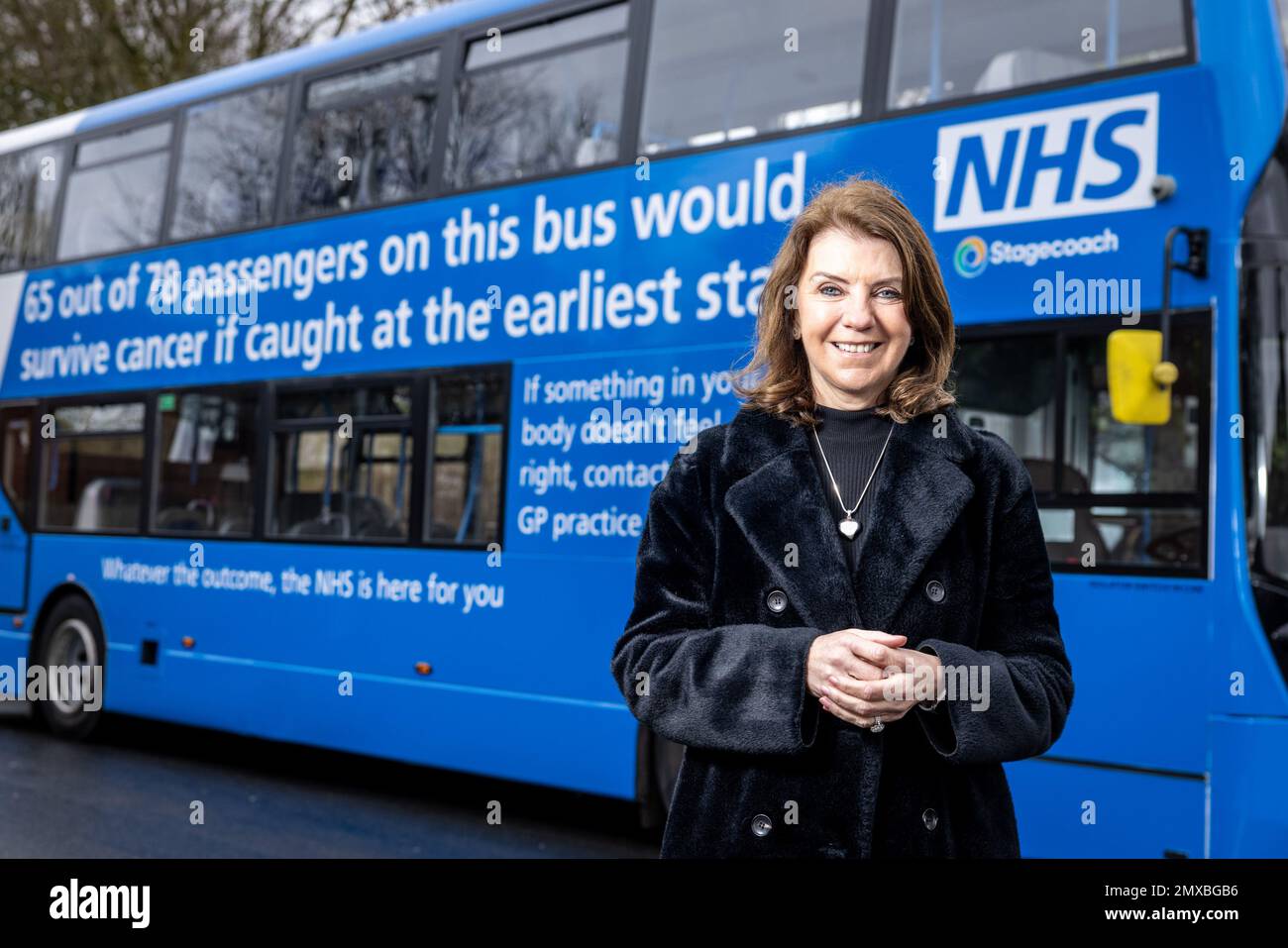 EDITORIAL USE ONLY Dr Dawn Harper alongside the 'NHS Bus-ting Cancer ...