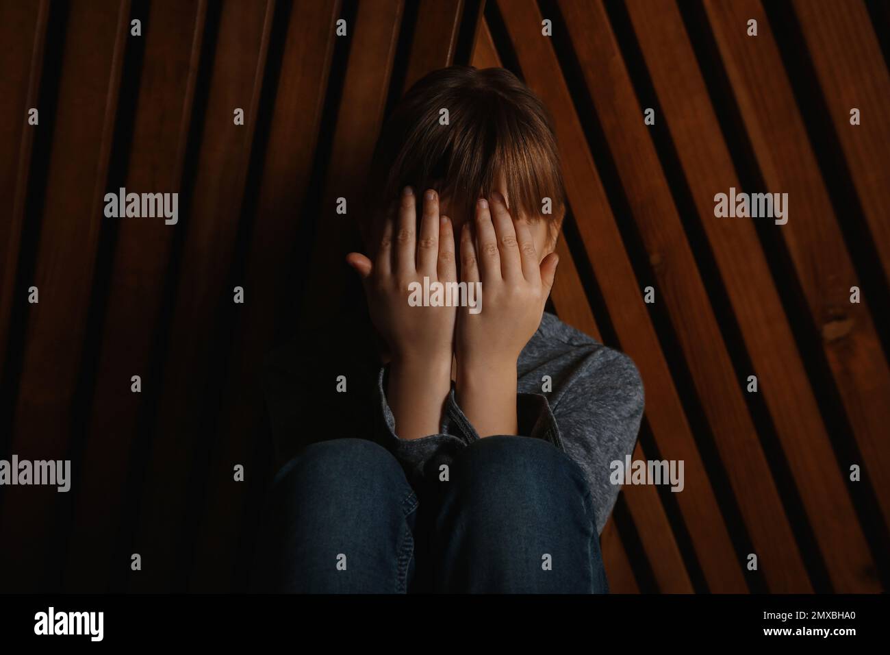 Claustrophobia. Stressed little girl feeling in closed space and crying ...