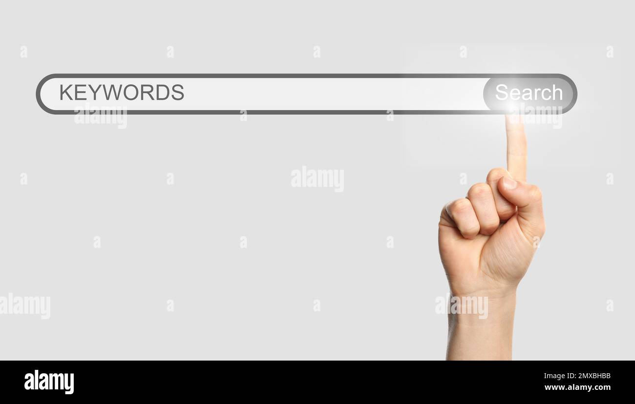 Man using search bar on virtual screen, closeup Stock Photo - Alamy