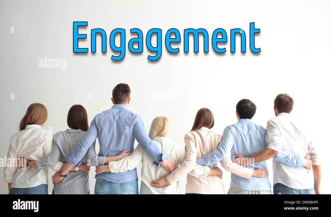 Engagement concept. People hugging together on light background Stock ...