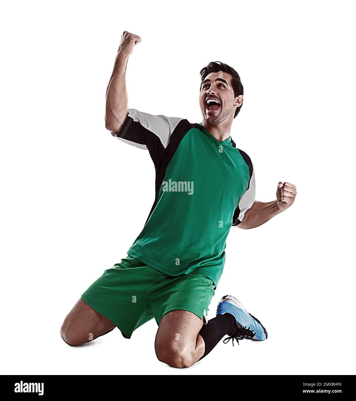 Young emotional football player on white background Stock Photo - Alamy
