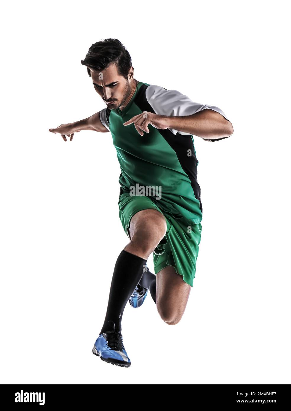 Young man playing football on white background Stock Photo - Alamy