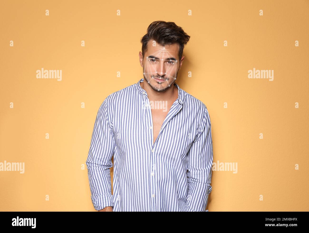 Facial recognition system. Young man with digital biometric grid on ...