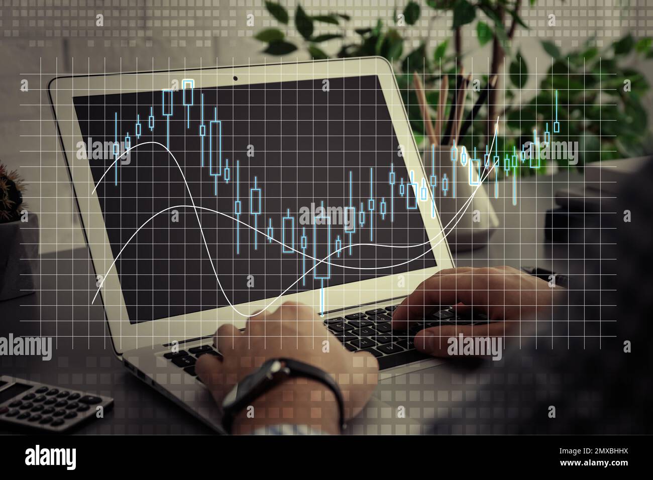 Forex trading. Man working with laptop at table and chart, closeup ...