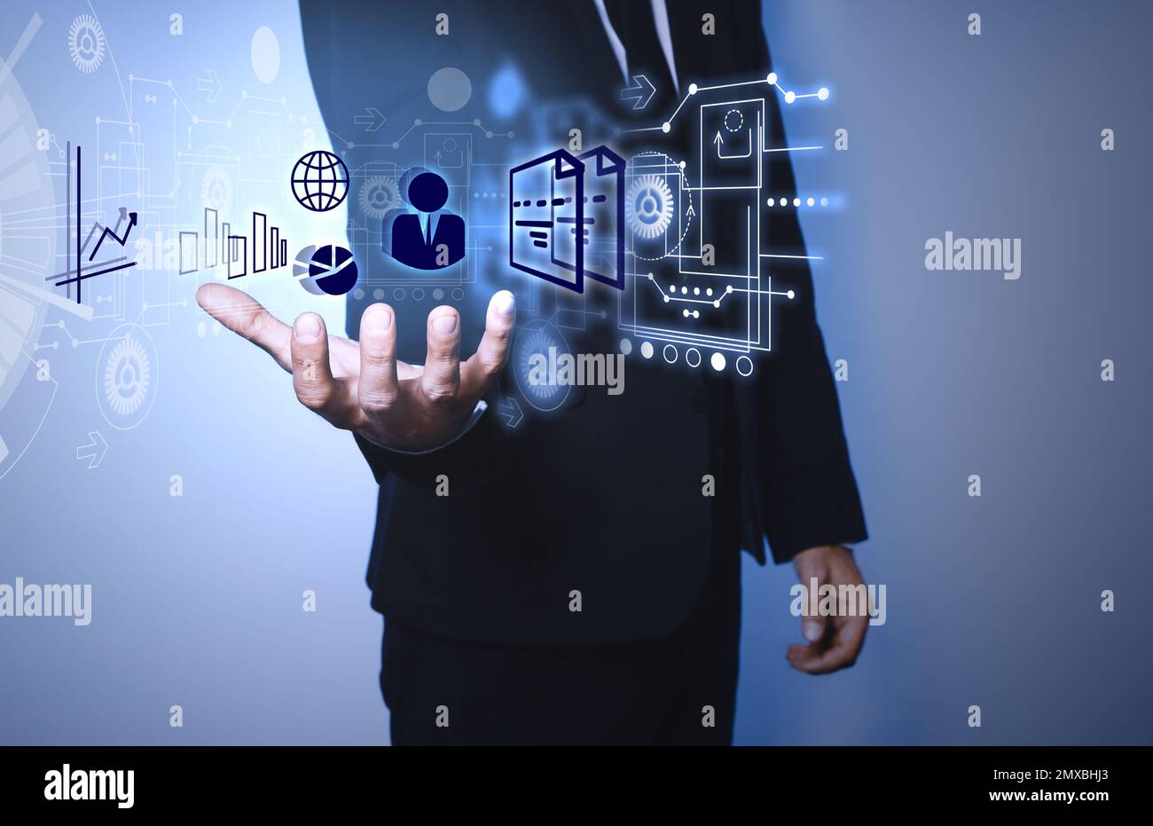Man demonstrating icons of data management system on light background ...
