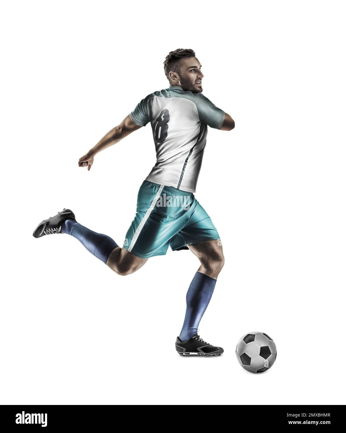 Young man playing football on white background Stock Photo - Alamy
