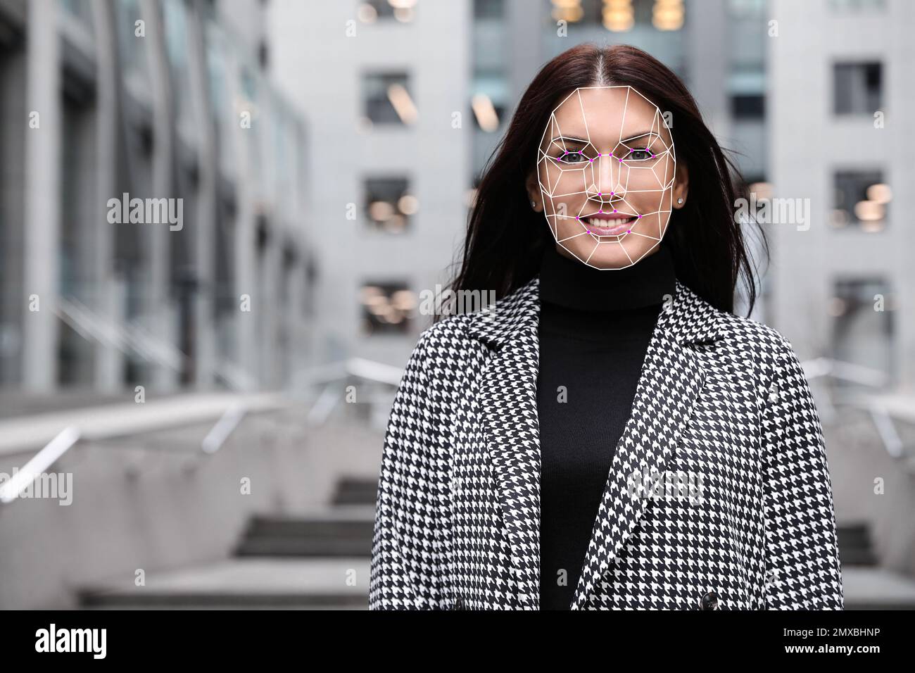 Facial recognition system. Mature woman with digital biometric grid ...