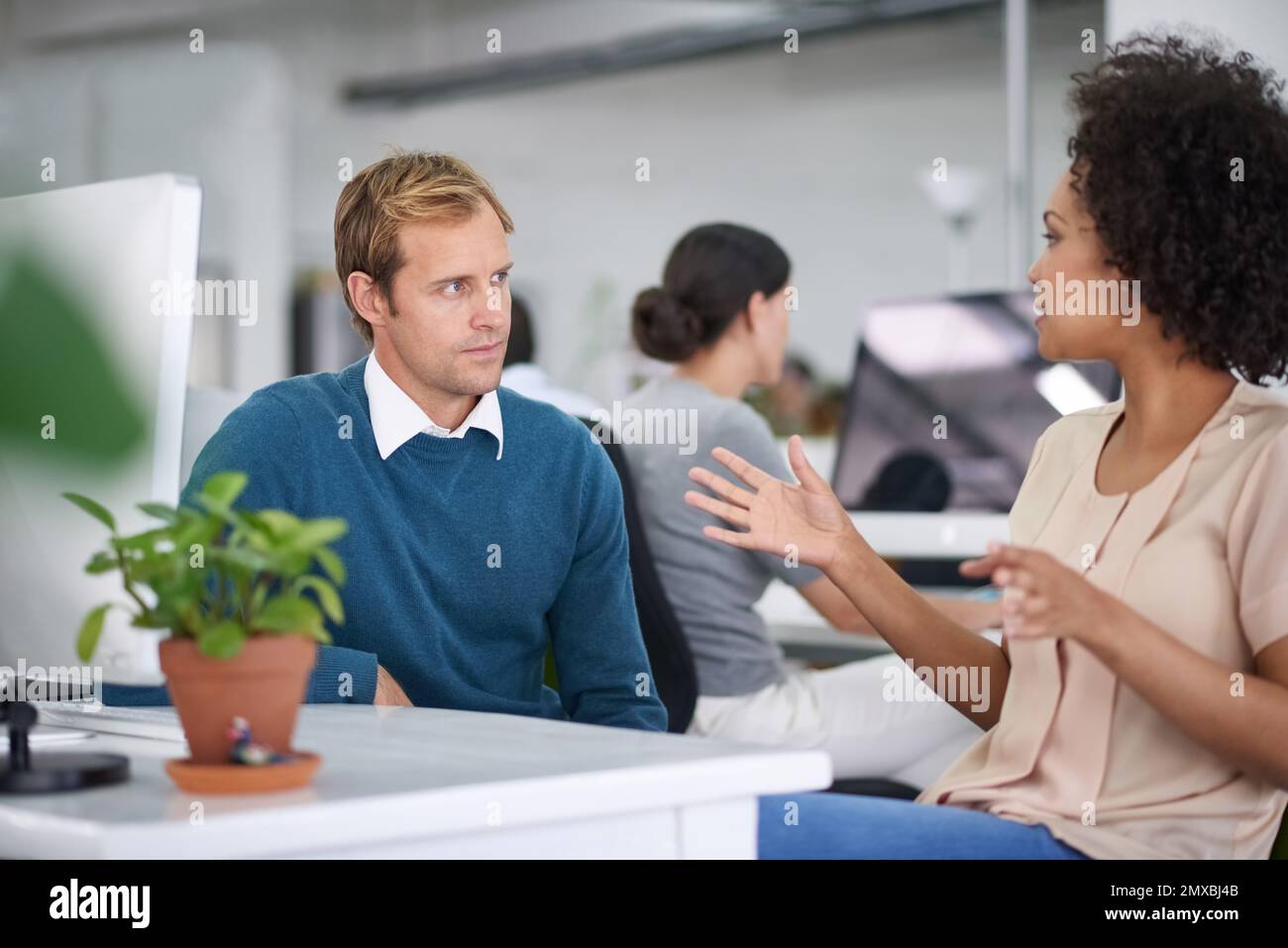 He takes all her ideas seriously. two colleagues having a brainstorming ...