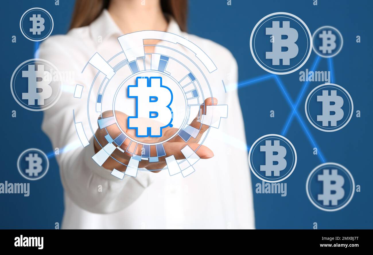 Fintech concept. Woman demonstrating scheme with bitcoin symbols Stock ...