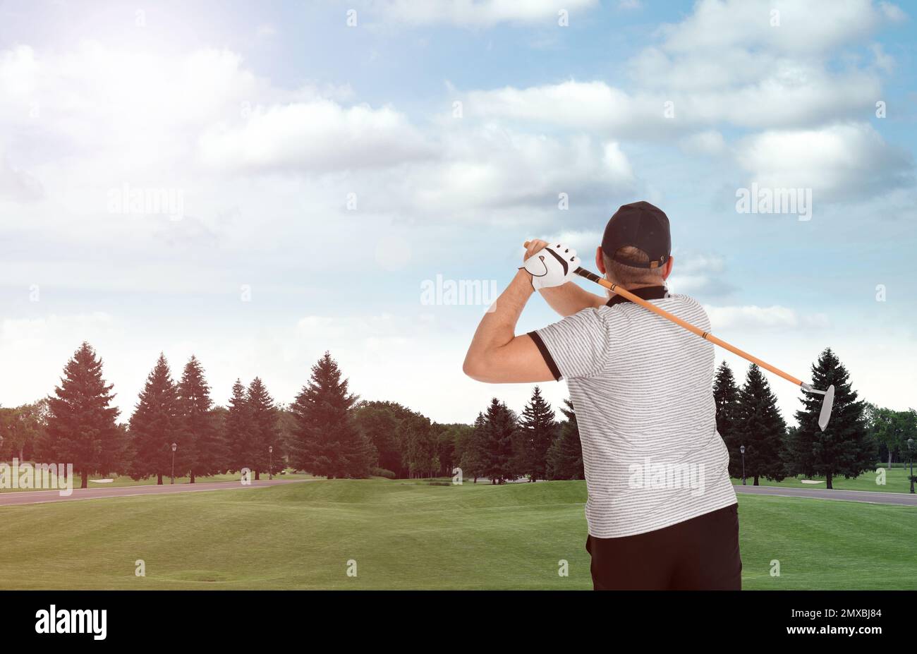 Back view action swinging sport hi-res stock photography and images - Alamy