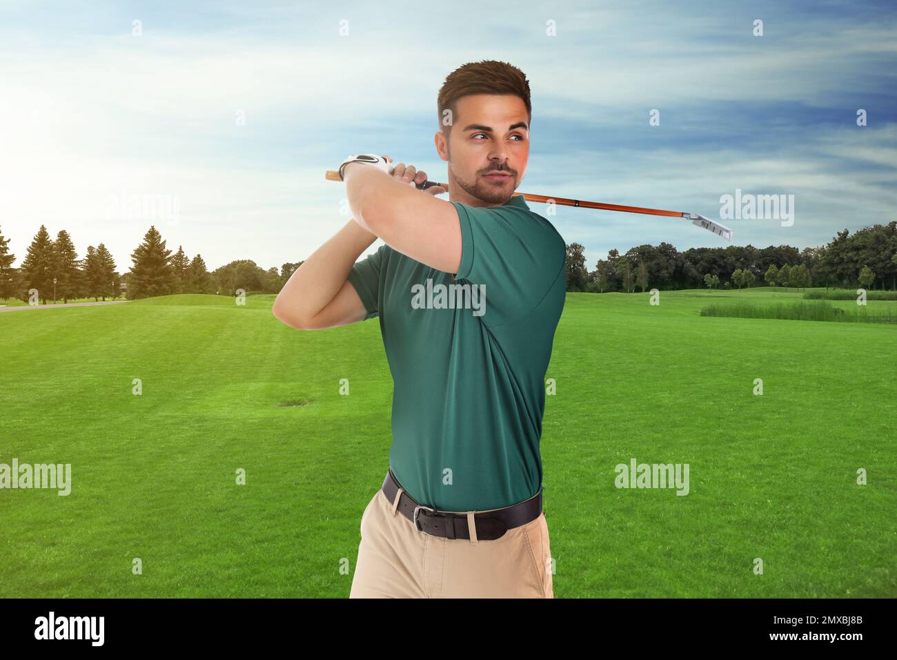 Man playing golf on course hi-res stock photography and images - Alamy