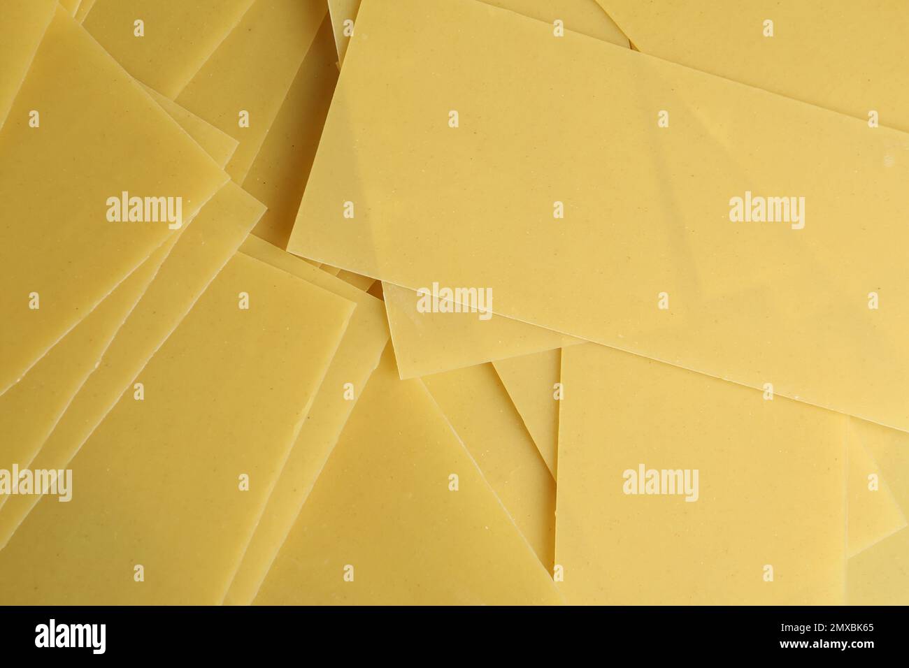 Pile of dry lasagna sheets as background, closeup Stock Photo - Alamy
