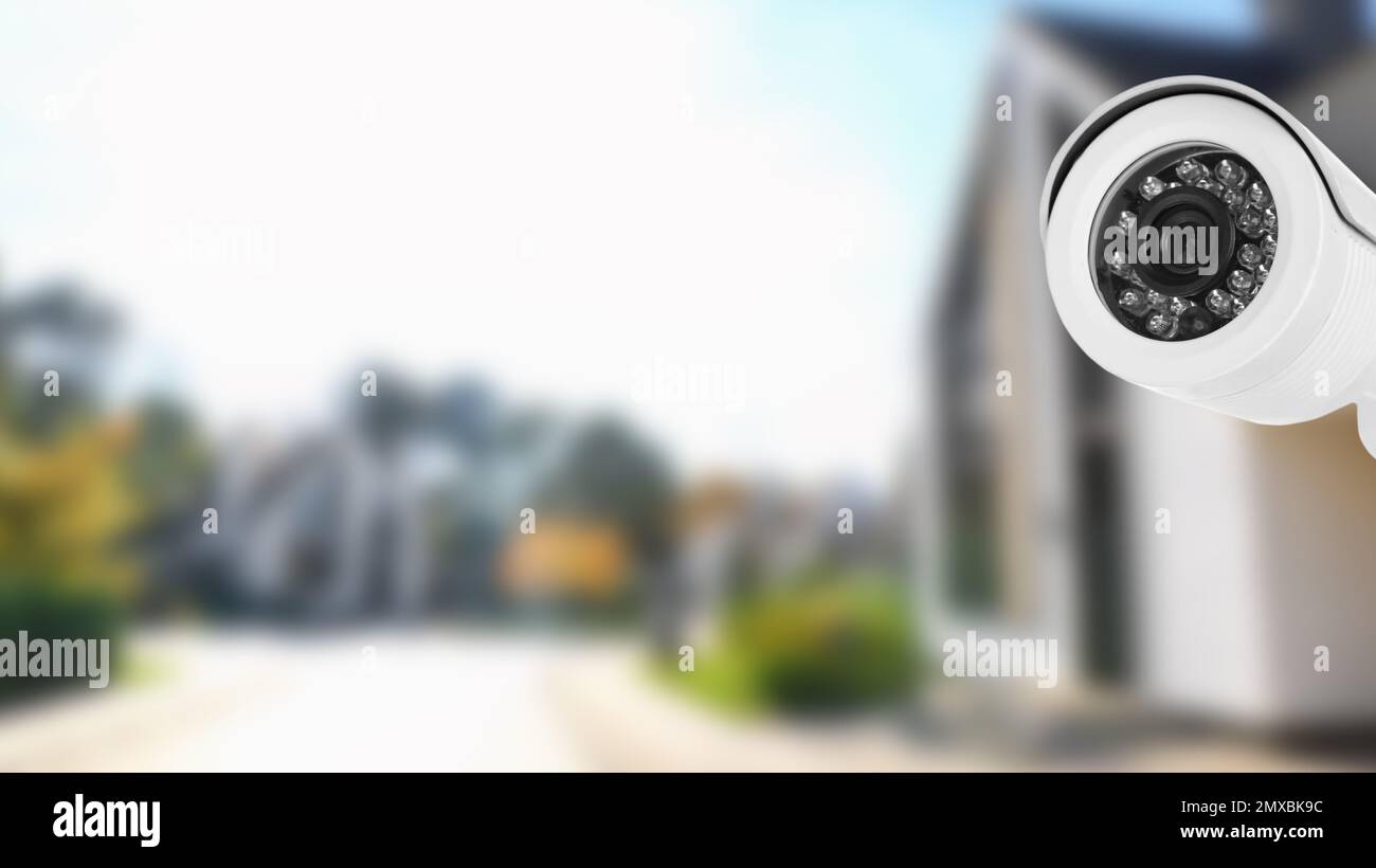 Home security system. House under CCTV camera surveillance Stock Photo ...