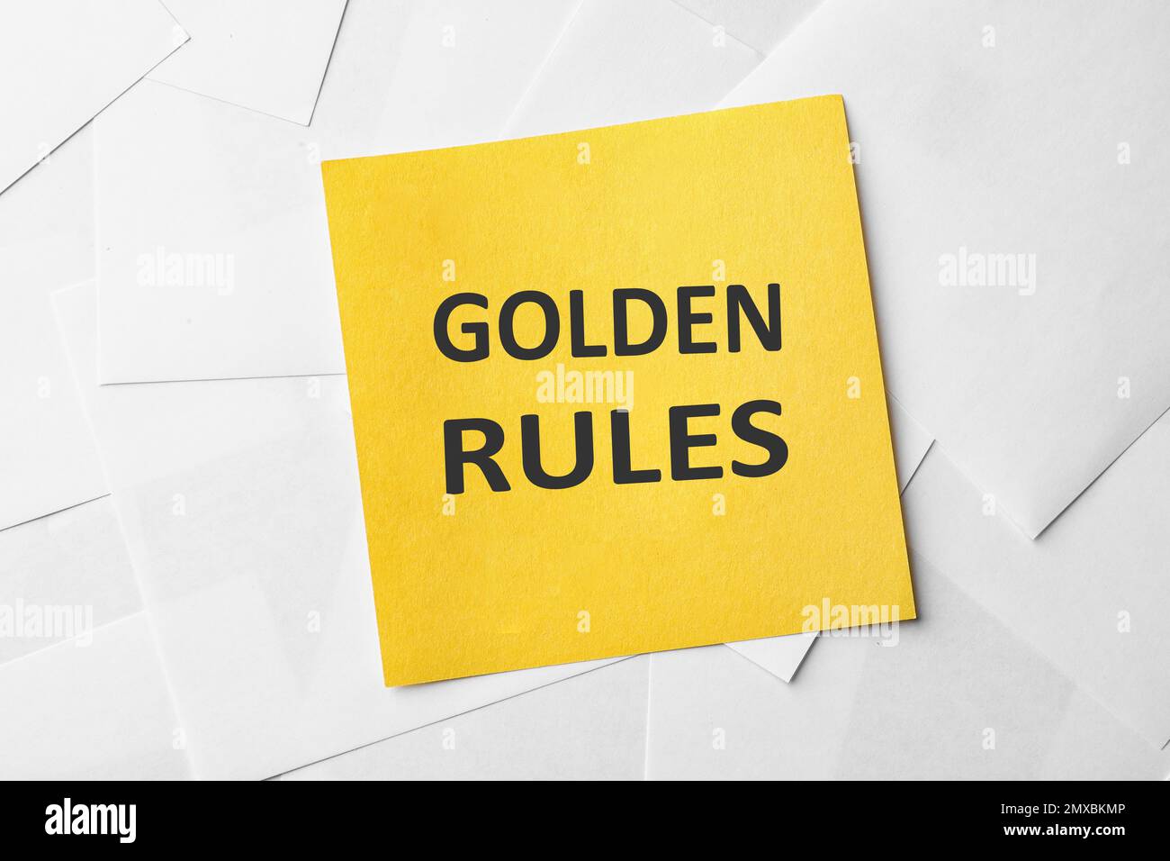 Note with words GOLDEN RULES on paper sheets, top view Stock Photo - Alamy
