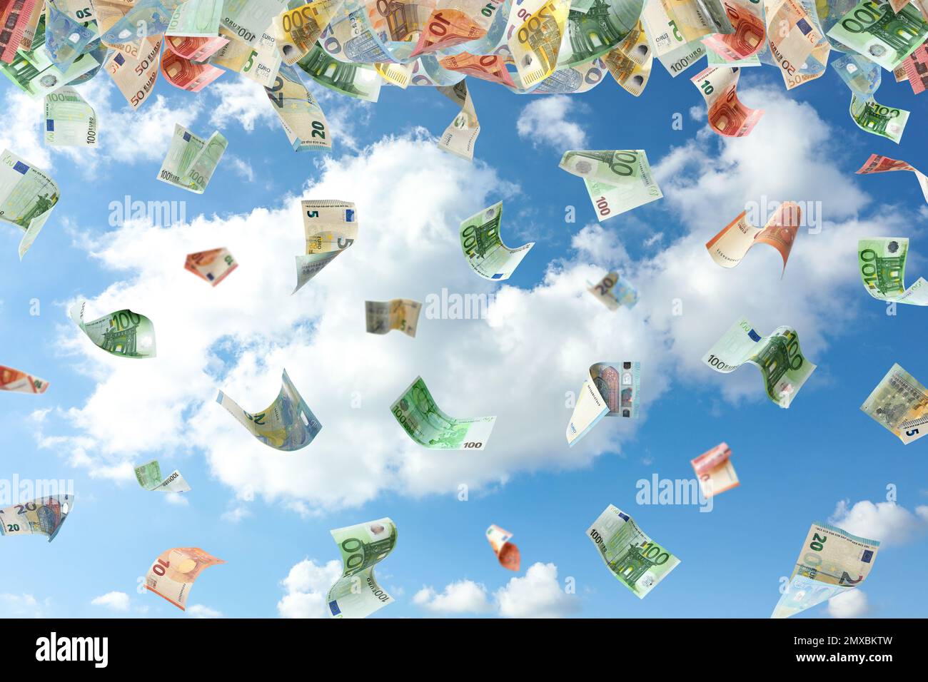 Falling Euro banknotes and blue sky on background. Money rain Stock ...