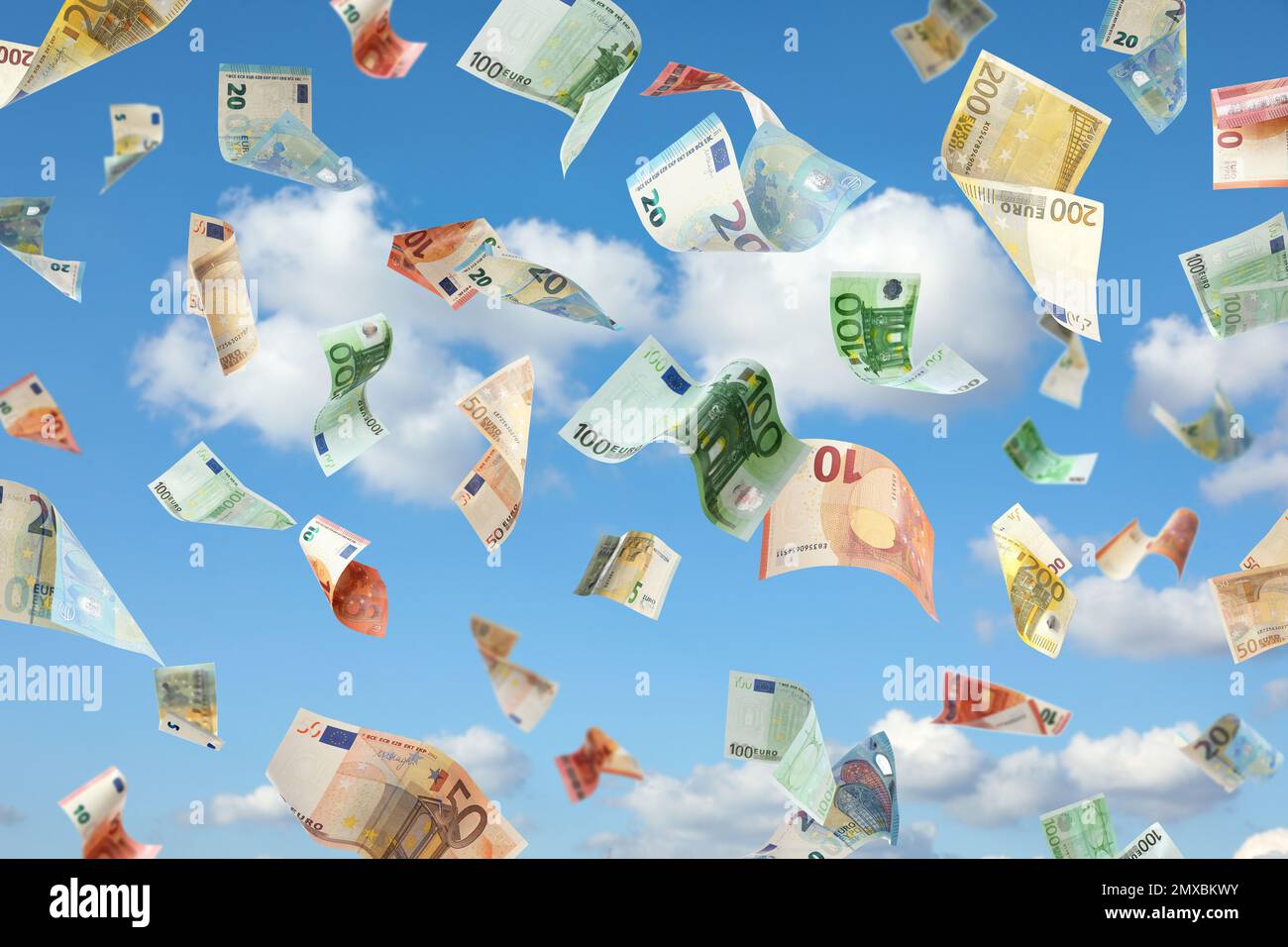 Falling Euro banknotes and blue sky on background. Money rain Stock ...