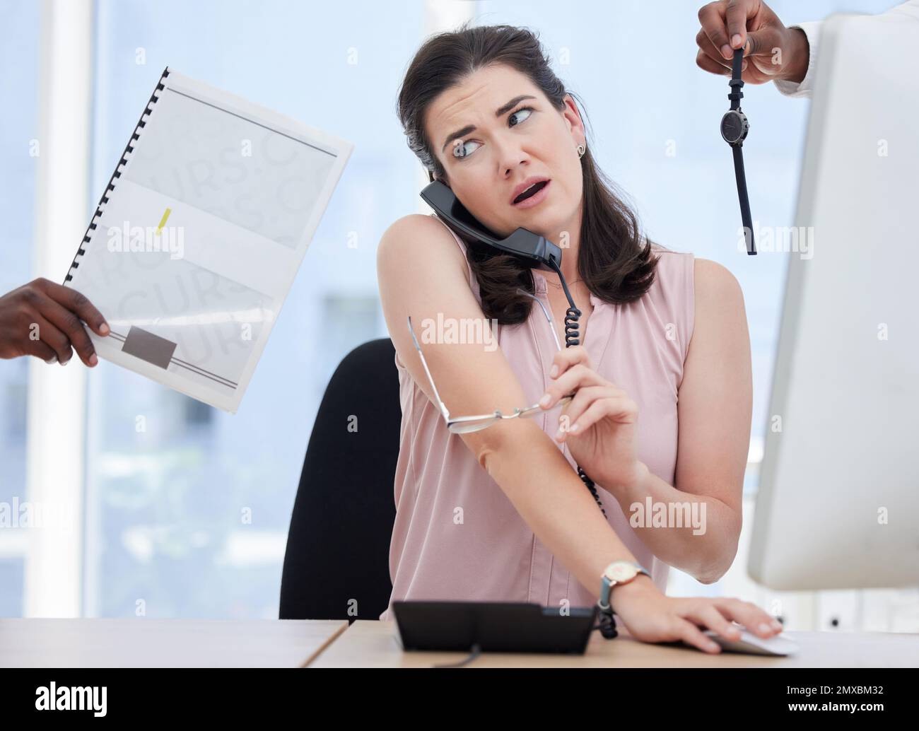 Phone call, documents and time with a multitasking woman in her office ...