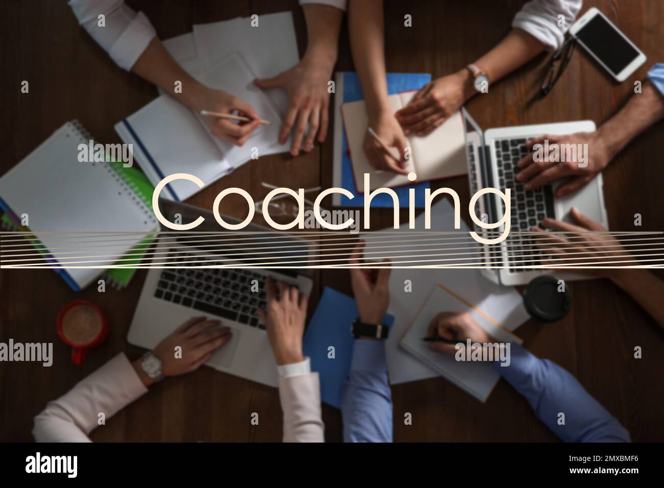 Adult learning. Word Coaching and people discussing work matters at ...