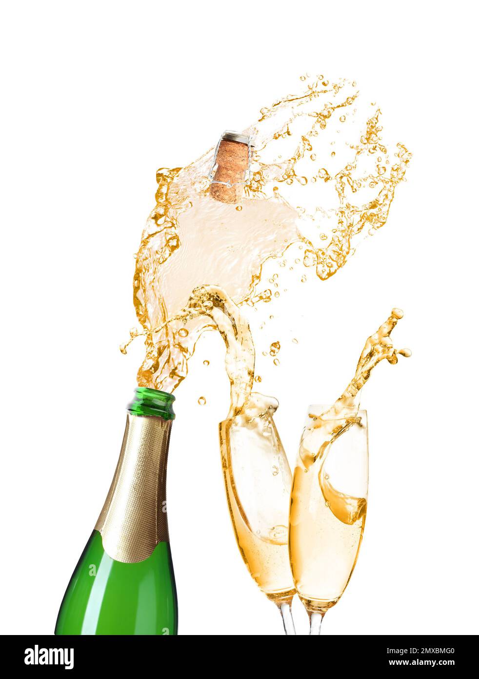 Champagne splashing out of bottle and glasses on white background Stock ...