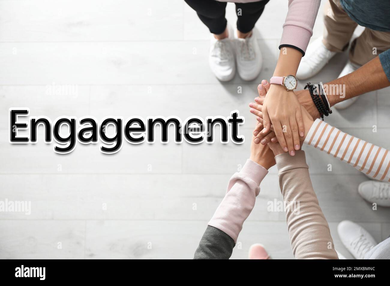 Engagement concept. People holding hands together, top view Stock Photo ...