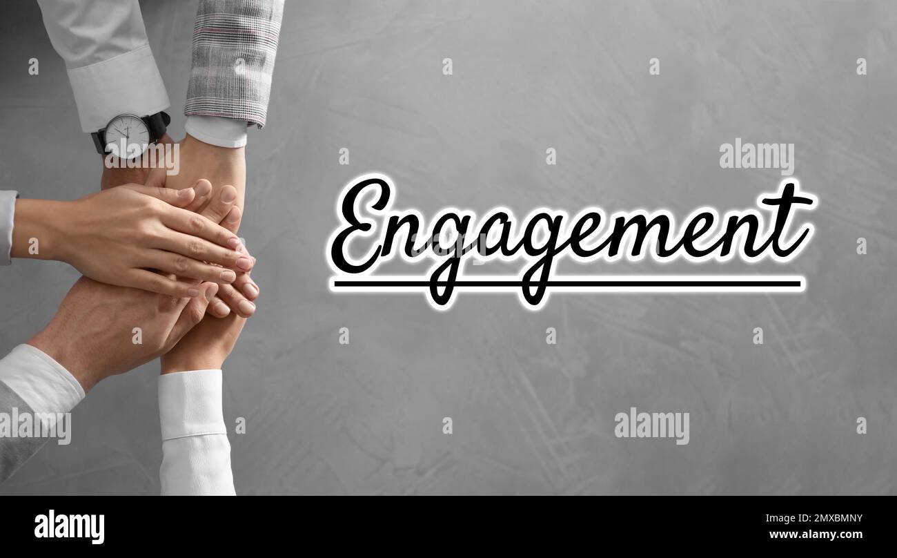 Engagement concept. People holding hands together, top view Stock Photo ...