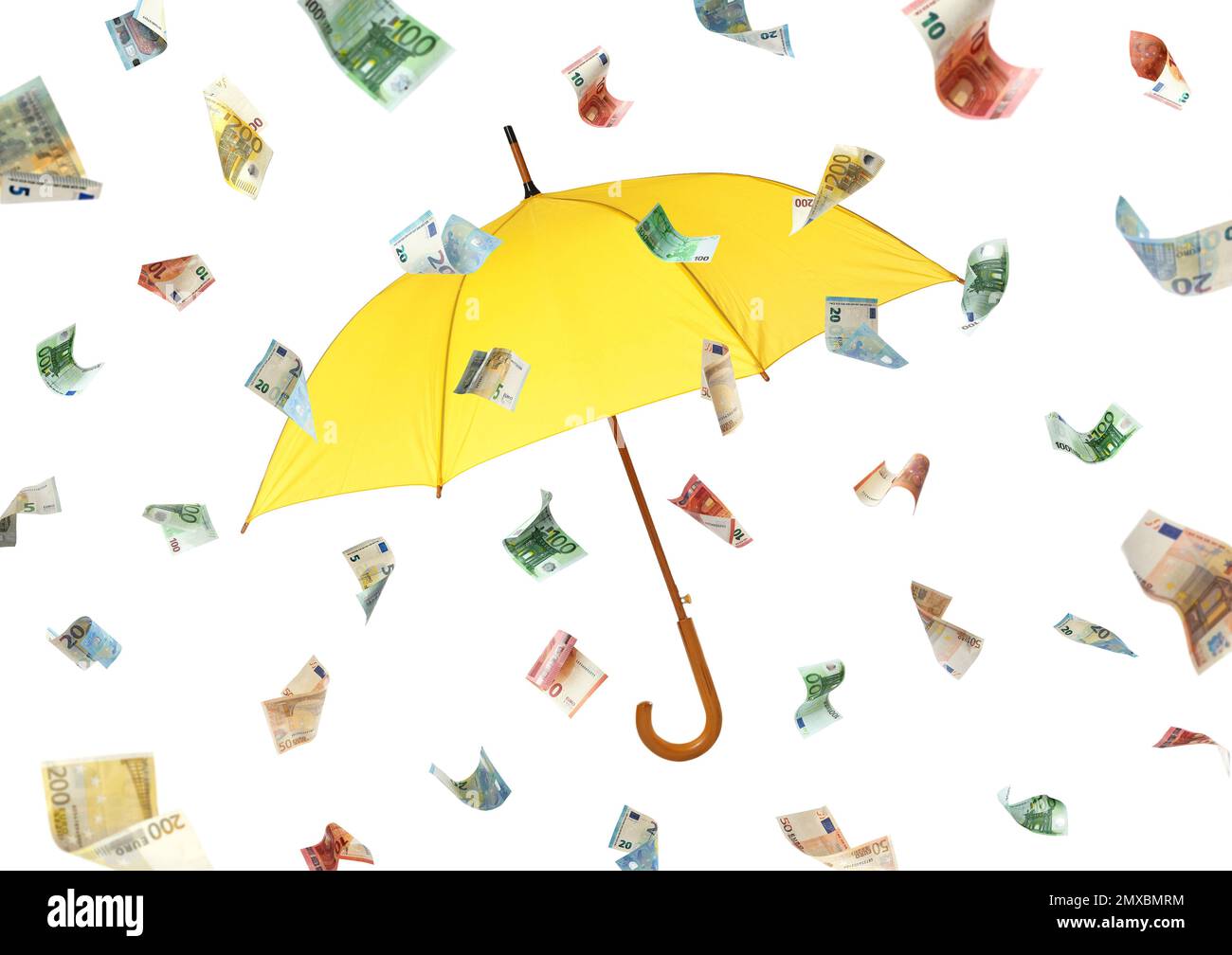 Yellow umbrella and money rain on white background Stock Photo - Alamy