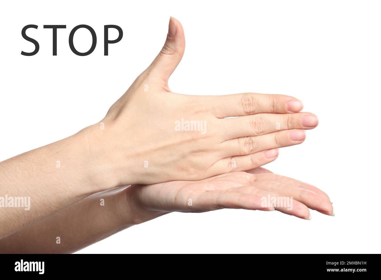 Woman showing word Stop on white background, closeup. American sign ...