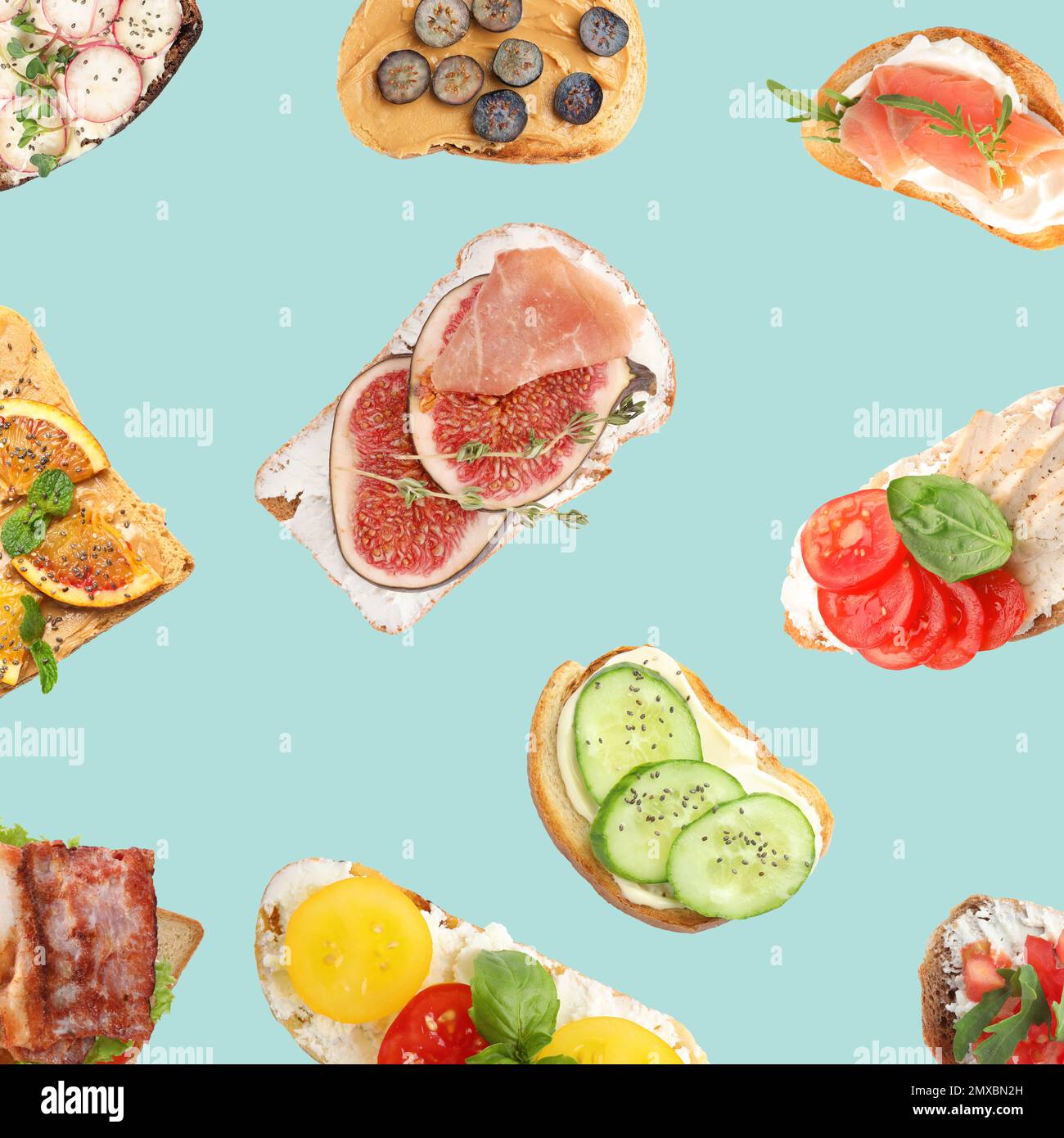 Set of delicious toasted bread with different toppings on light ...