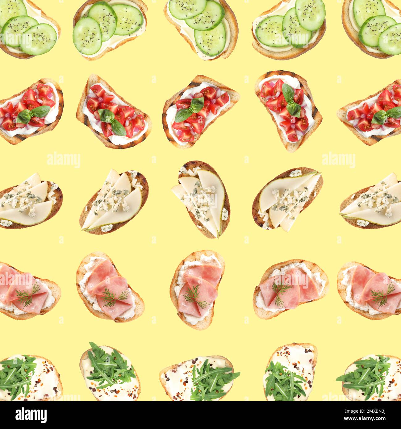 Set of delicious toasted bread with different toppings on yellow ...