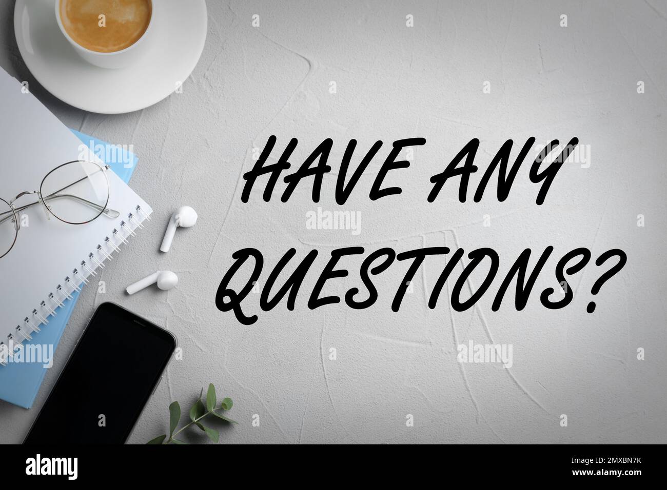 Flat lay composition with office stationery and phrase HAVE ANY ...