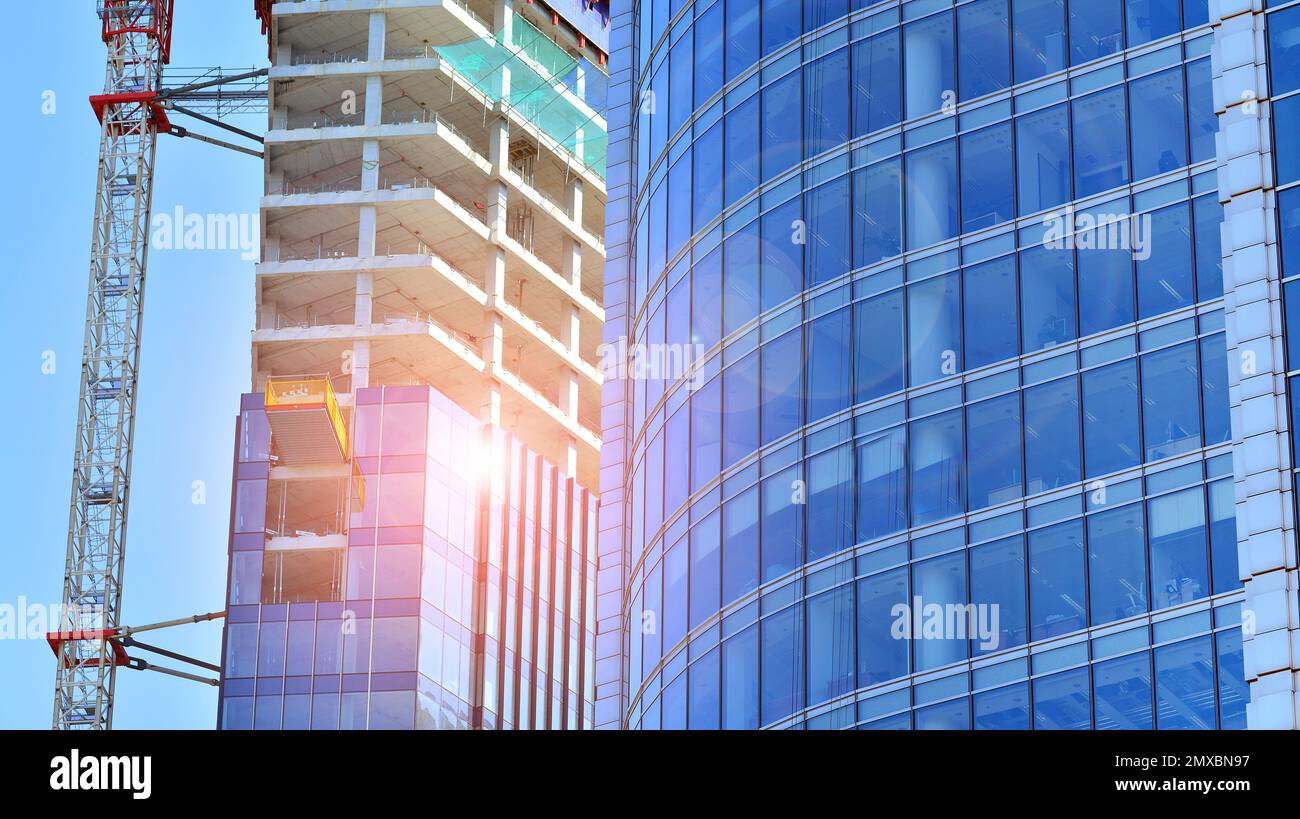 High-rise building under construction. Modern office building. Sunrise ...