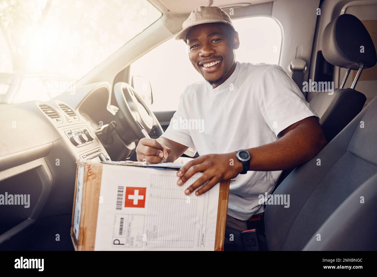 Delivery, box and portrait of courier man in car with checklist for ...