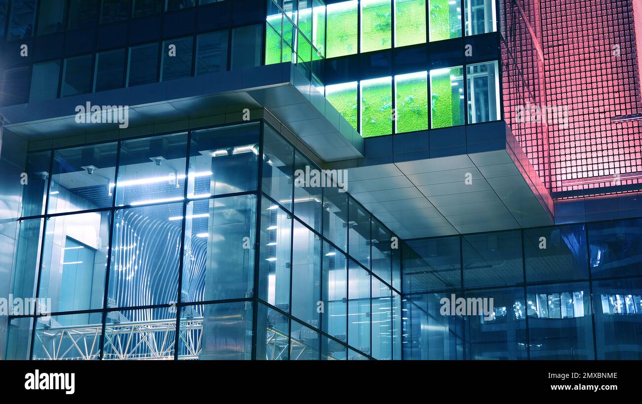 Amazing night cityscape. Office building at night, building facade with ...