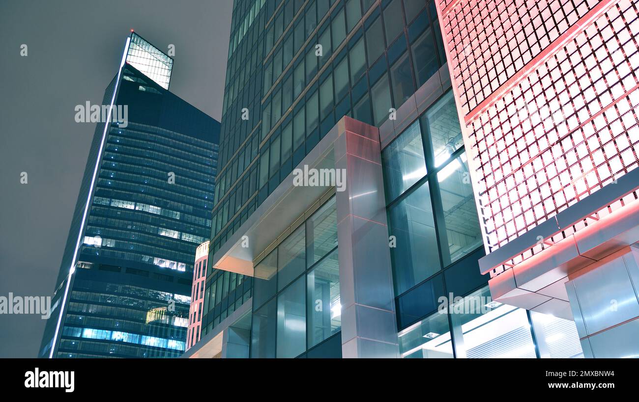 Amazing night cityscape. Office building at night, building facade with ...