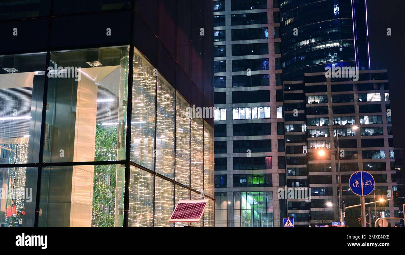 Amazing night cityscape. Office building at night, building facade with ...