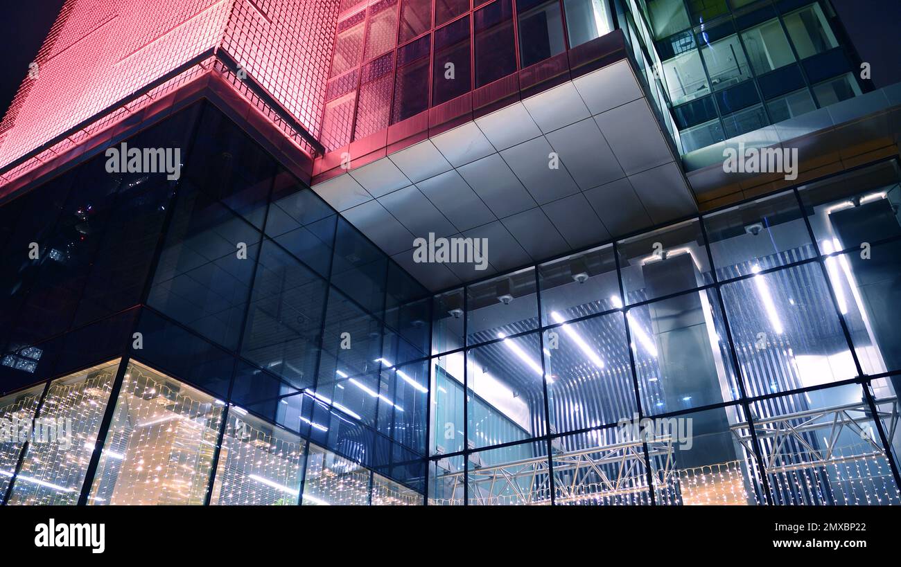 Amazing night cityscape. Office building at night, building facade with ...