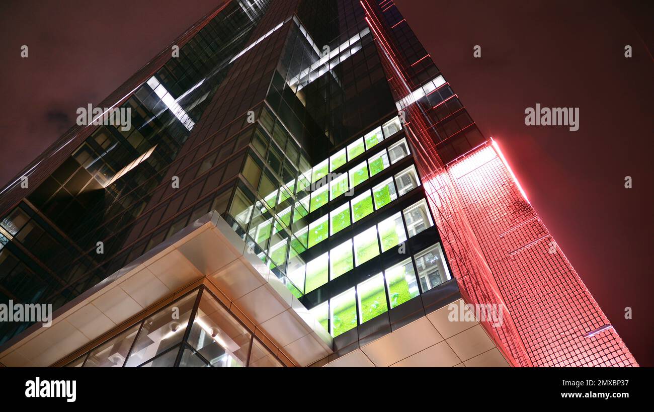 Amazing night cityscape. Office building at night, building facade with ...