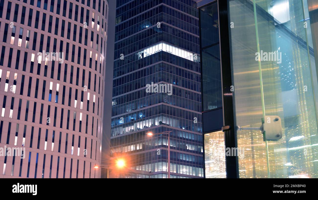 Amazing night cityscape. Office building at night, building facade with ...