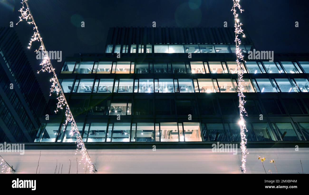 Amazing night cityscape. Office building at night, building facade with ...