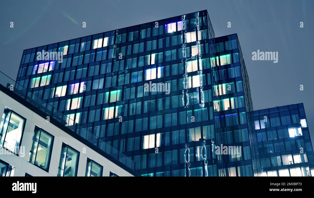 Amazing night cityscape. Office building at night, building facade with ...