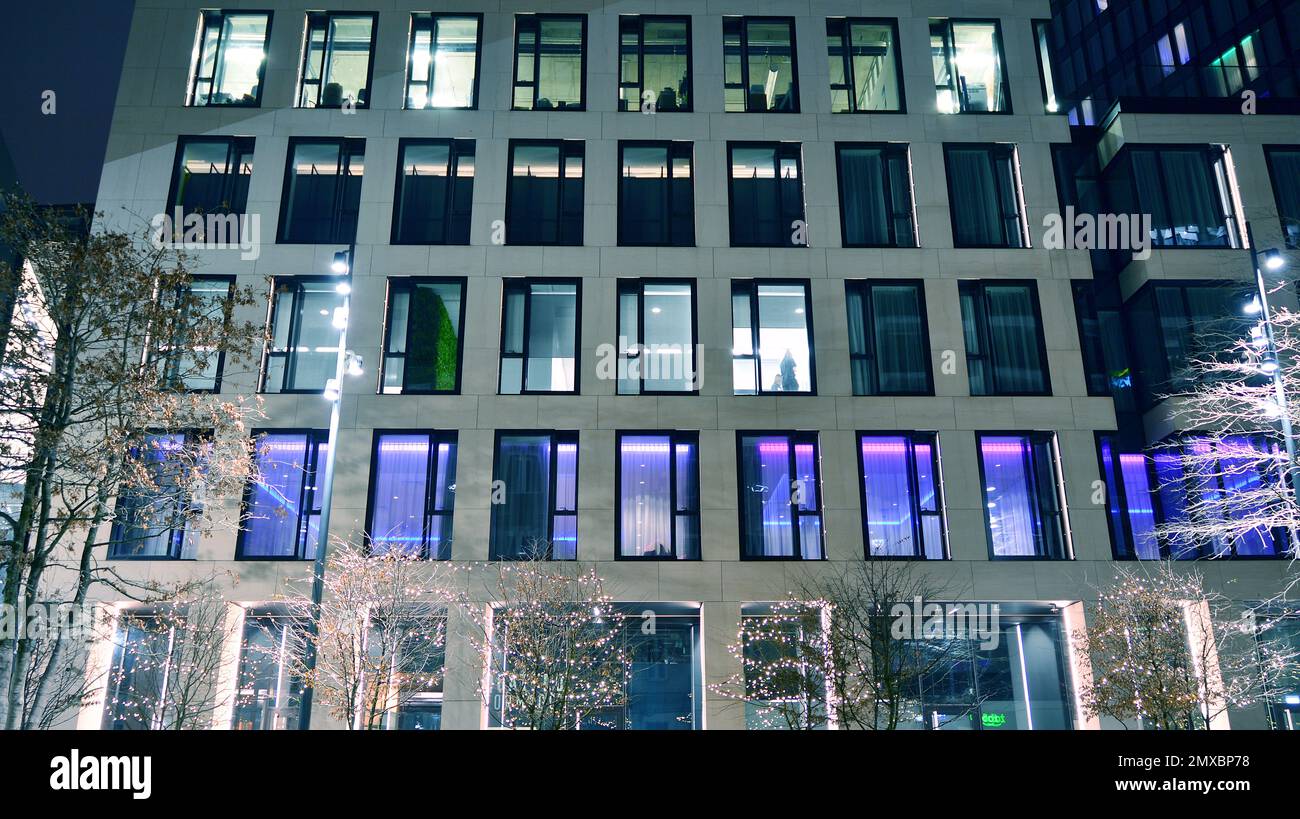 Amazing night cityscape. Office building at night, building facade with ...