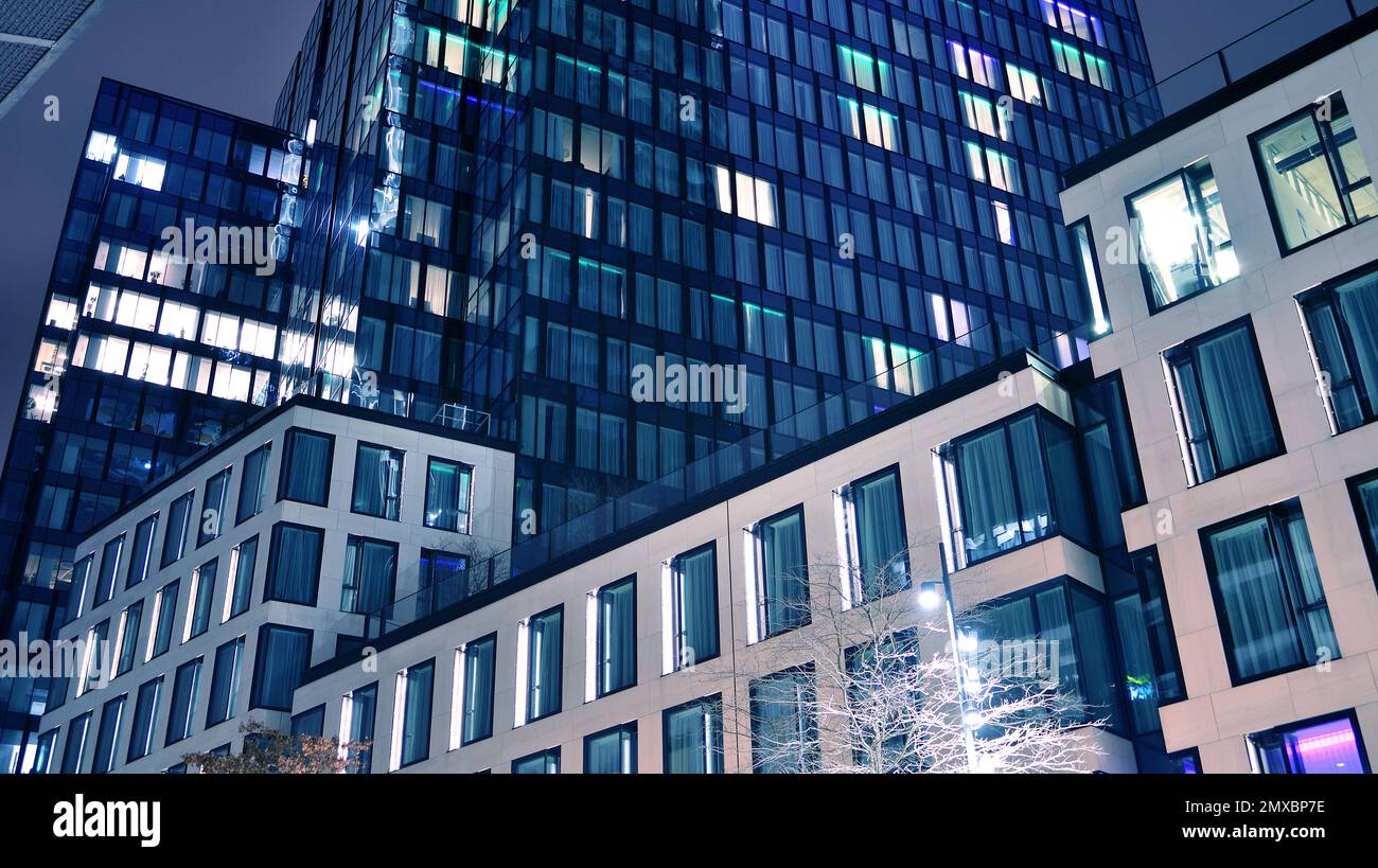 Amazing night cityscape. Office building at night, building facade with ...