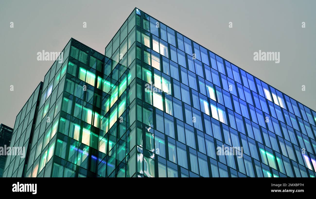 Amazing night cityscape. Office building at night, building facade with ...