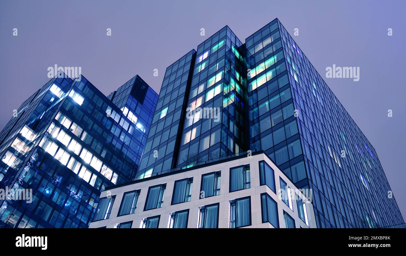 Amazing night cityscape. Office building at night, building facade with ...