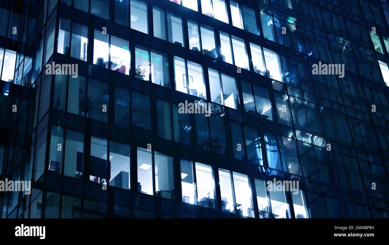 Amazing night cityscape. Office building at night, building facade with ...